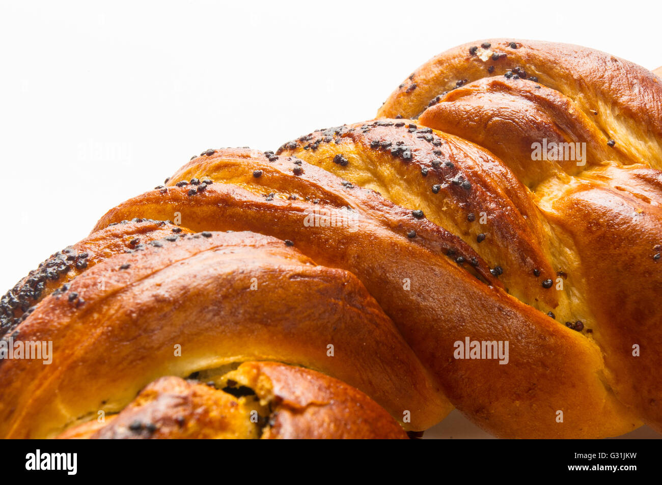 braided poppy seed round loaf on white background Stock Photo - Alamy