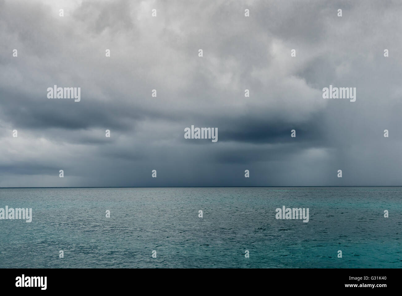 toward horizon and dark cloudy rainy sky above great ocean Stock Photo ...