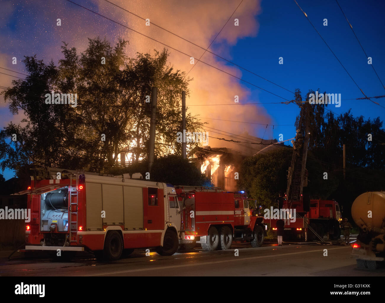 number of fire engines involved in fire fighting Stock Photo - Alamy