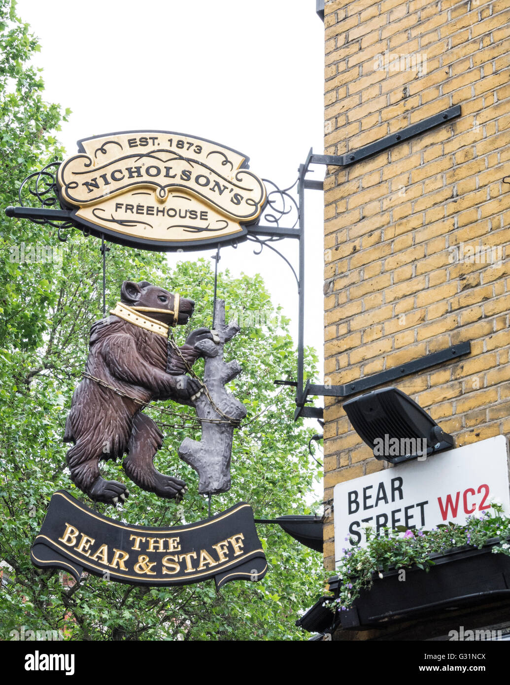 Street sign outside the Bear public House in Bear Street, London, WC2 ...