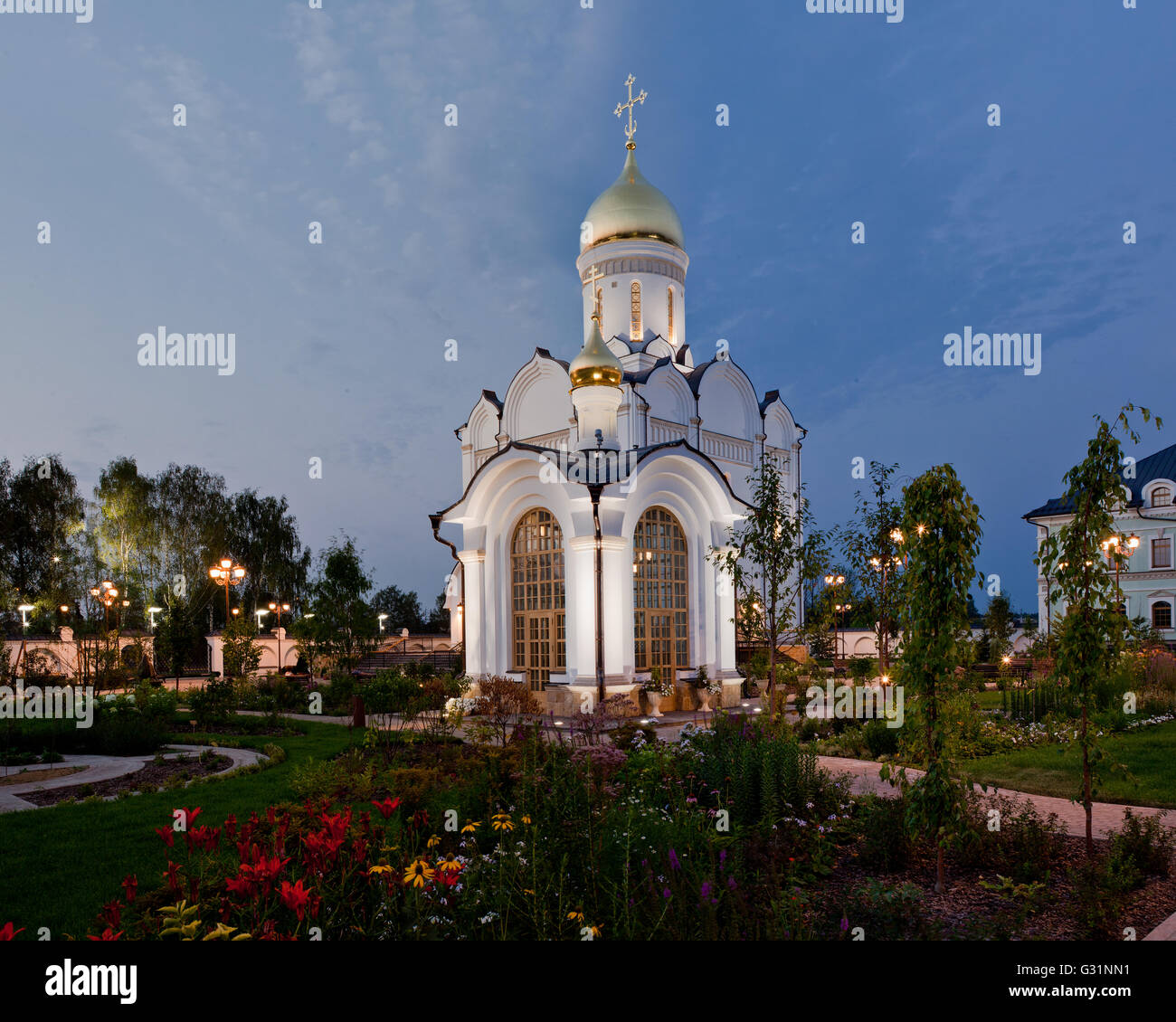 Orthodox temple complex. The chapel. Architectural lighting. Sidewalks ...