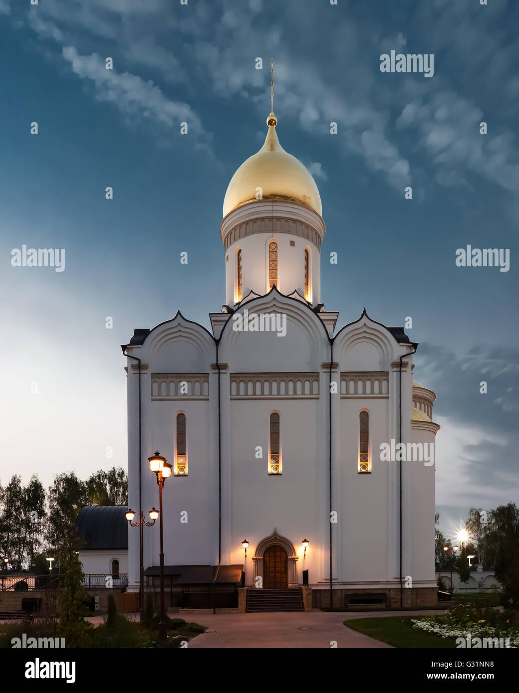Orthodox temple complex. View of the portal of the temple with evening ...