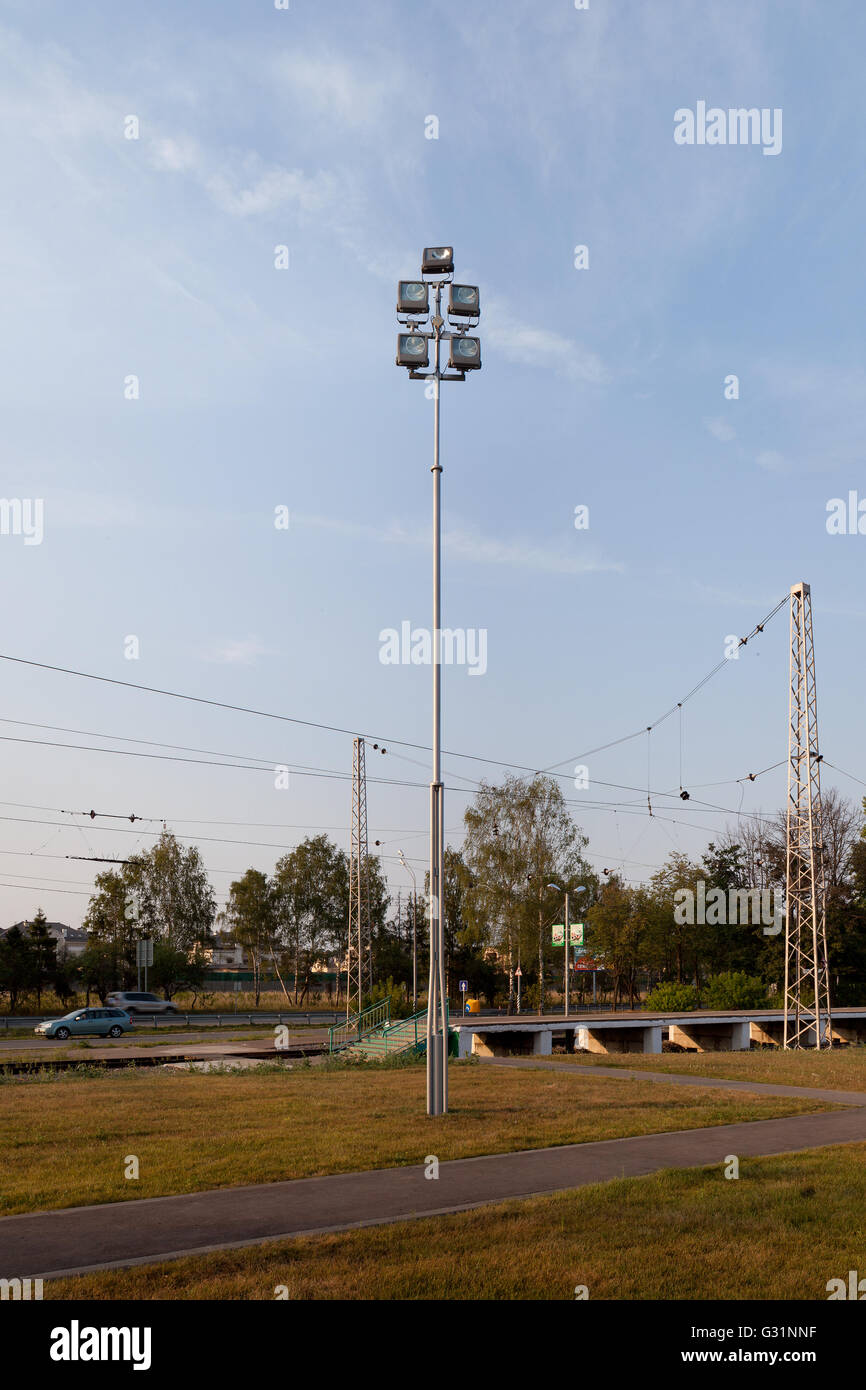 Mast with flood lights. Lighting pylon Stock Photo - Alamy