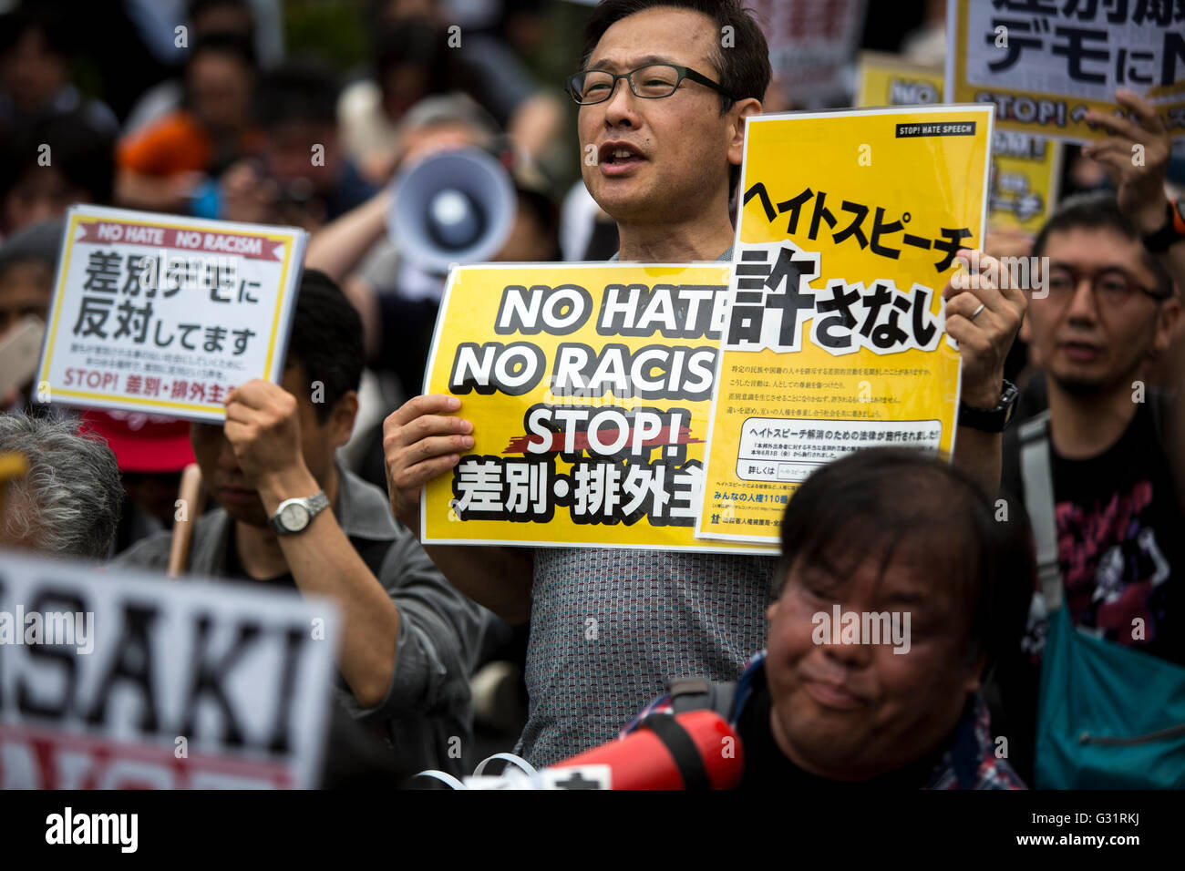 KAWASAKI, JAPAN - JUNE 05: Anti-fascist and anti-racist groups with ...