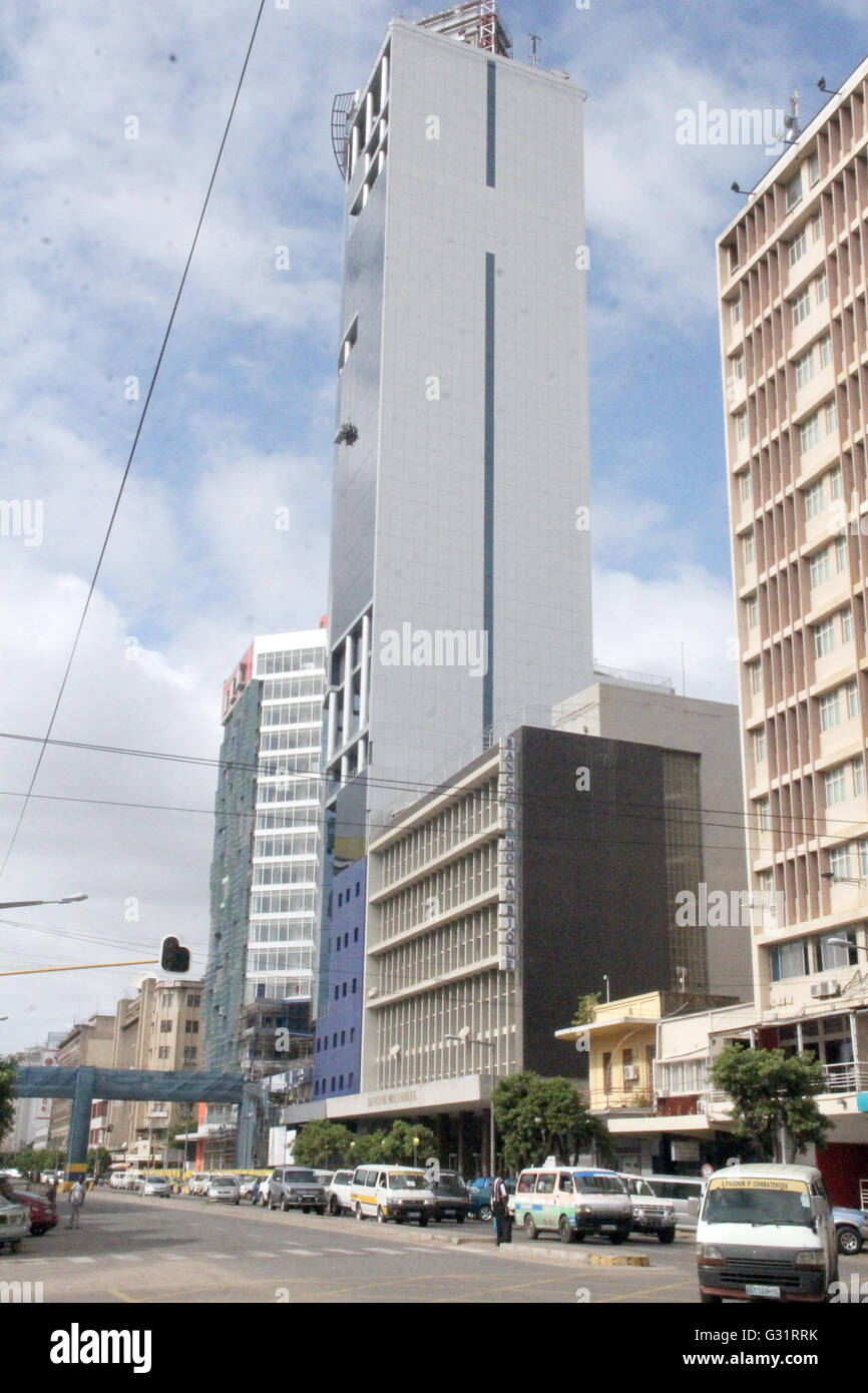 People walk in the center of Mozambique's capital Maputo on May 21 ...
