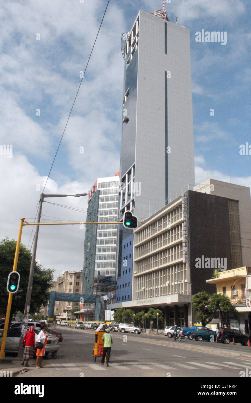 People walk in the center of Mozambique's capital Maputo on May 21 ...