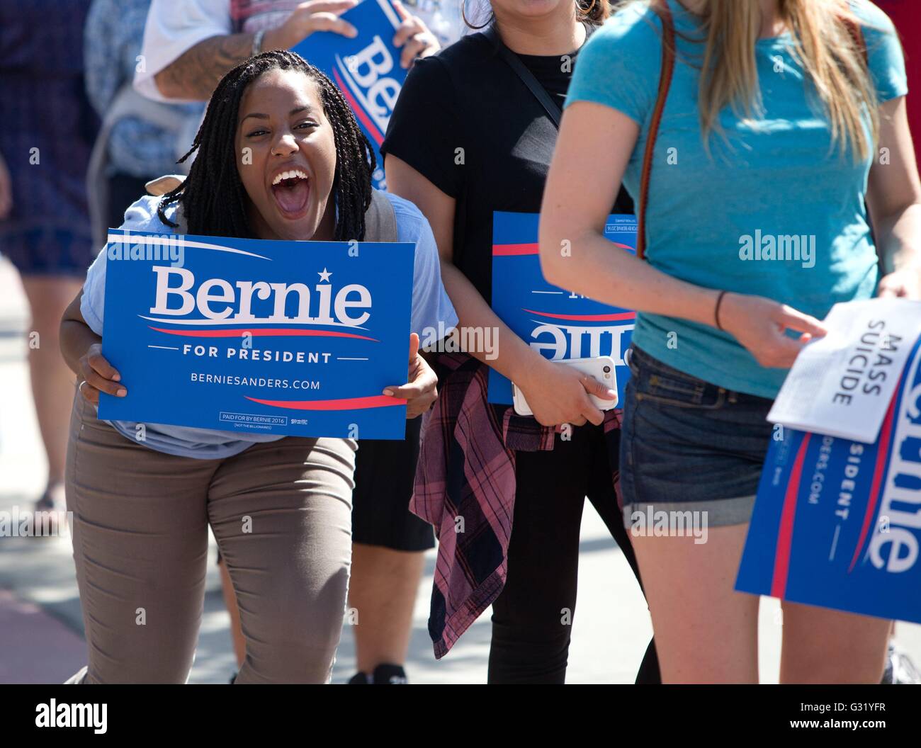 Woman holding a Bernie sign at the Bernie Sanders rally in San Diego ...