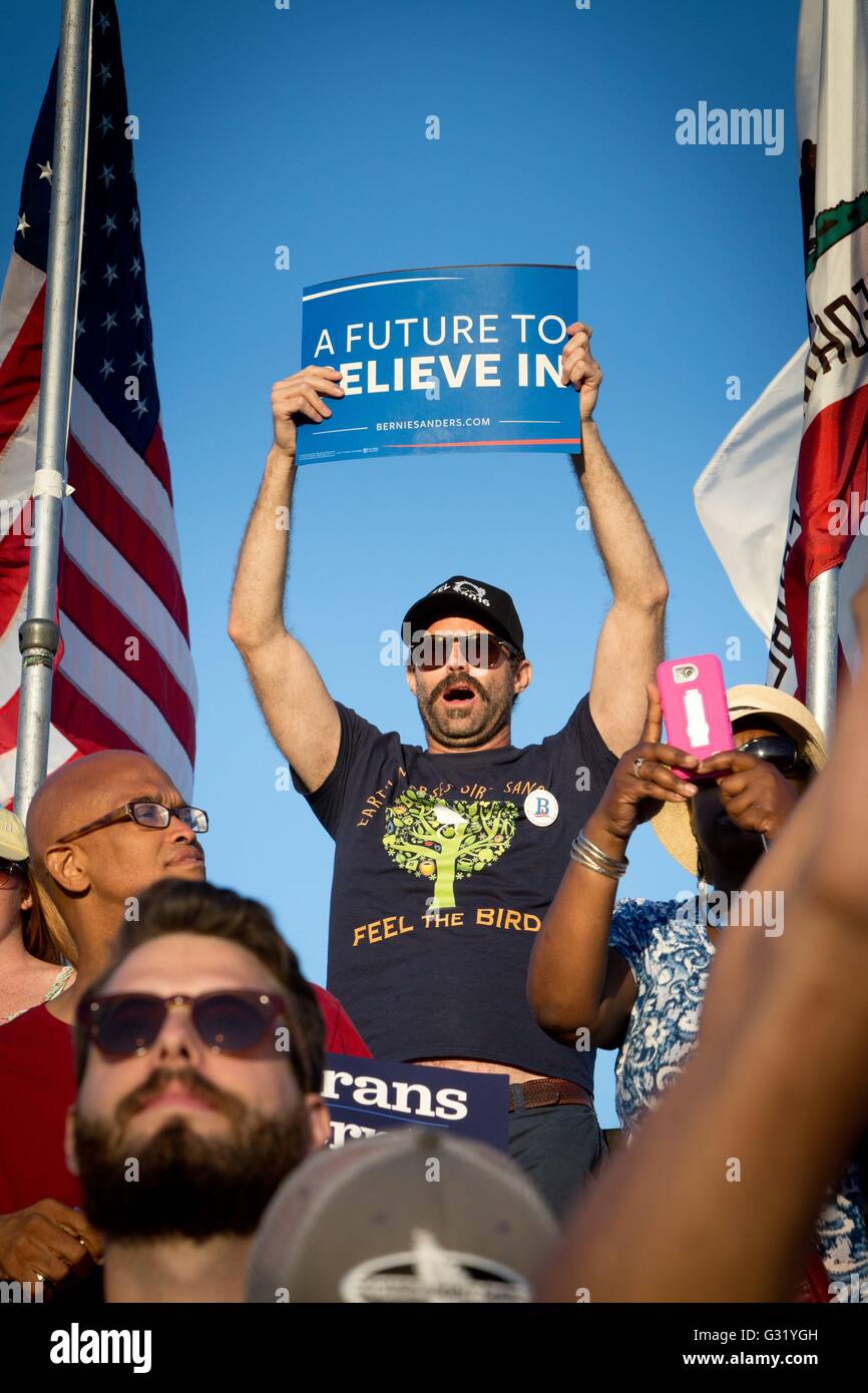 Man holding a Bernie sign at the Bernie Sanders rally in San Diego, in ...