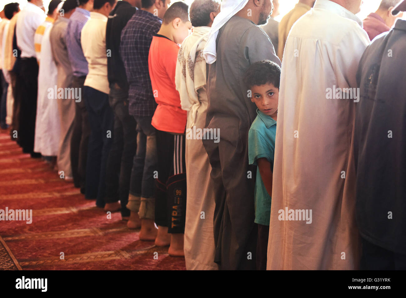 Muslims pray on first hi-res stock photography and images - Alamy