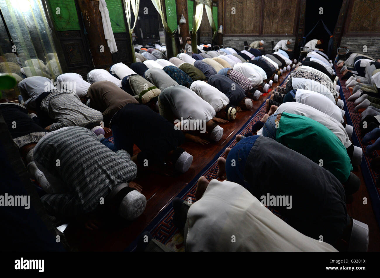 Xi'an, China's Shaanxi Province. 6th June, 2016. Muslims pray on the ...
