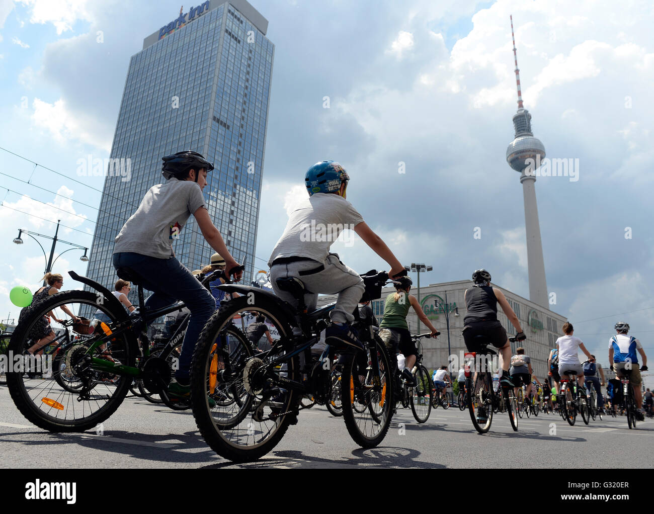 Berlin, Germany. 05th June, 2016. Cyclists ride past the television ...