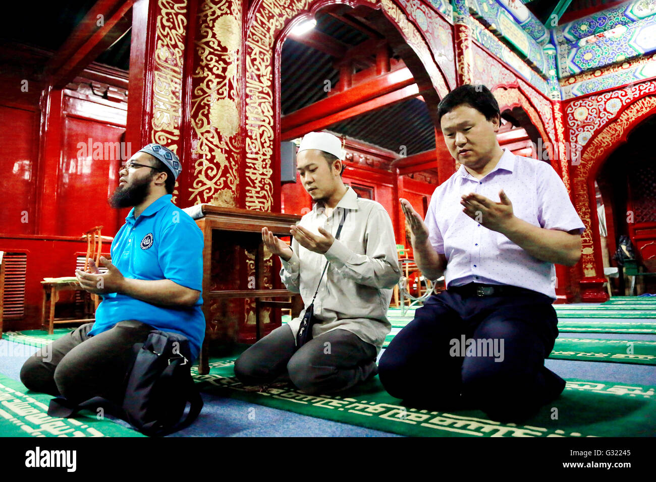 Beijing, China. 6th June, 2016. Muslims pray on the first day of ...
