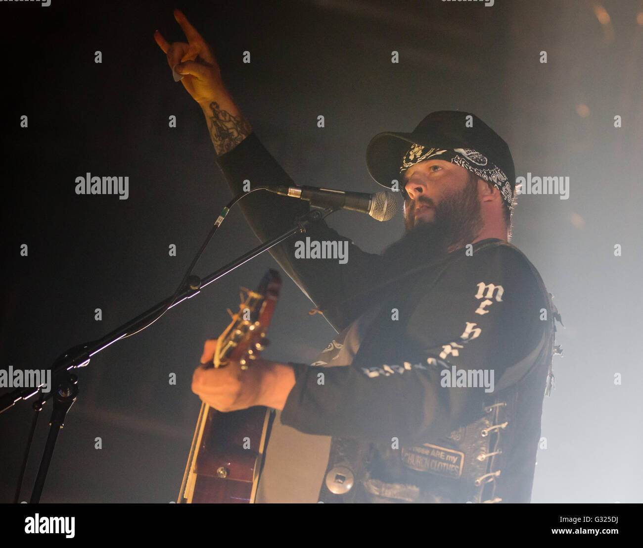 The US-american musician Bob Wayne is on stage during a concert in ...