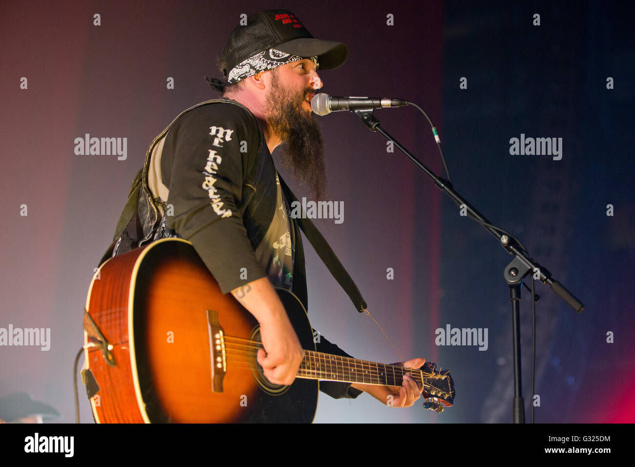 The US-american musician Bob Wayne is on stage during a concert in ...