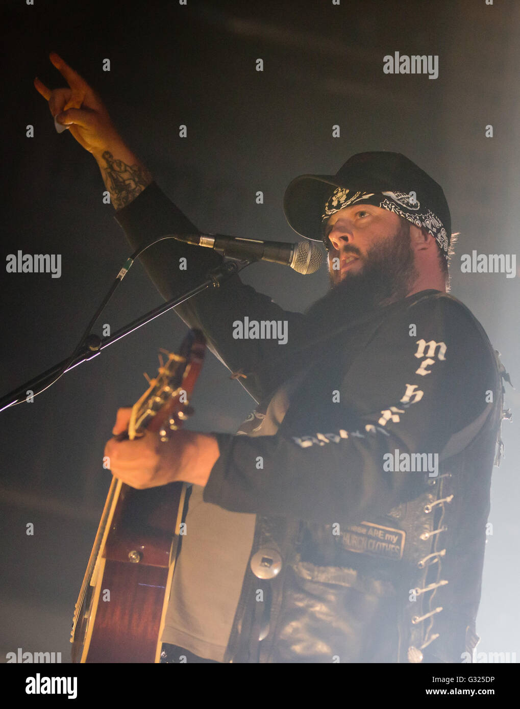 The US-american musician Bob Wayne is on stage during a concert in ...