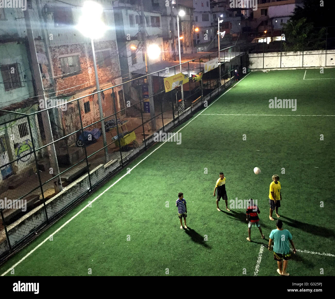 Rio de Janeiro, Brazil. 2nd May, 2016. People playing soccer on a ...