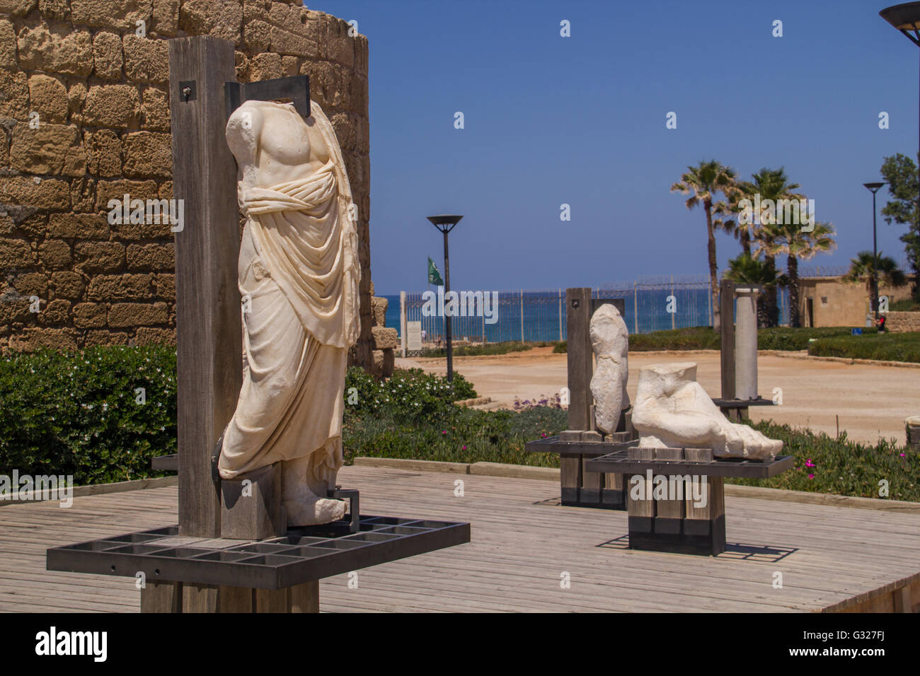 Ancient statues and marine artifacts in harbor of Caesarea National ...
