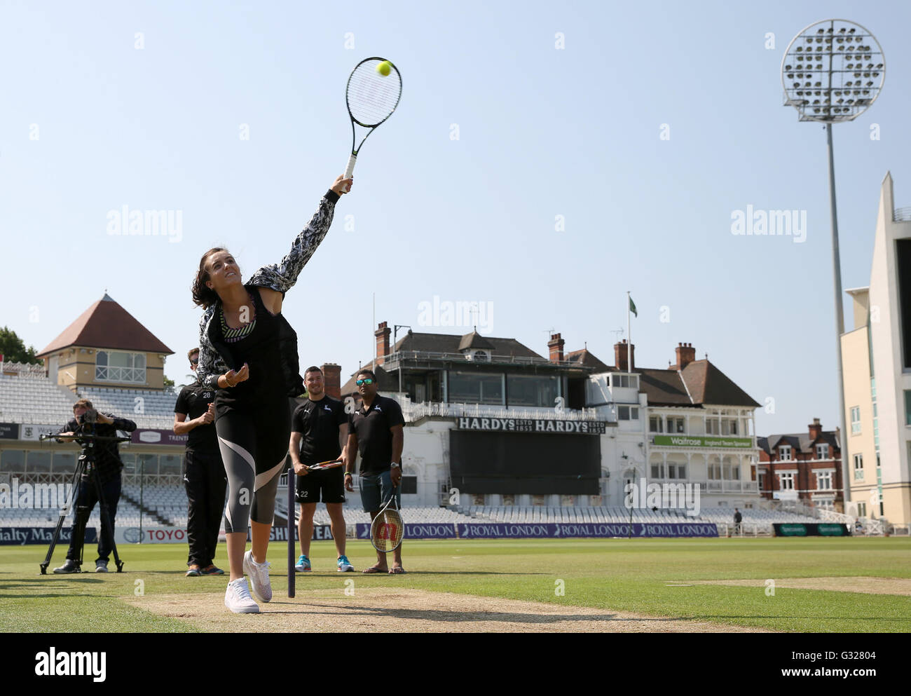 Laura Robson serves during a photocall at Trent Bridge, Nottingham ...