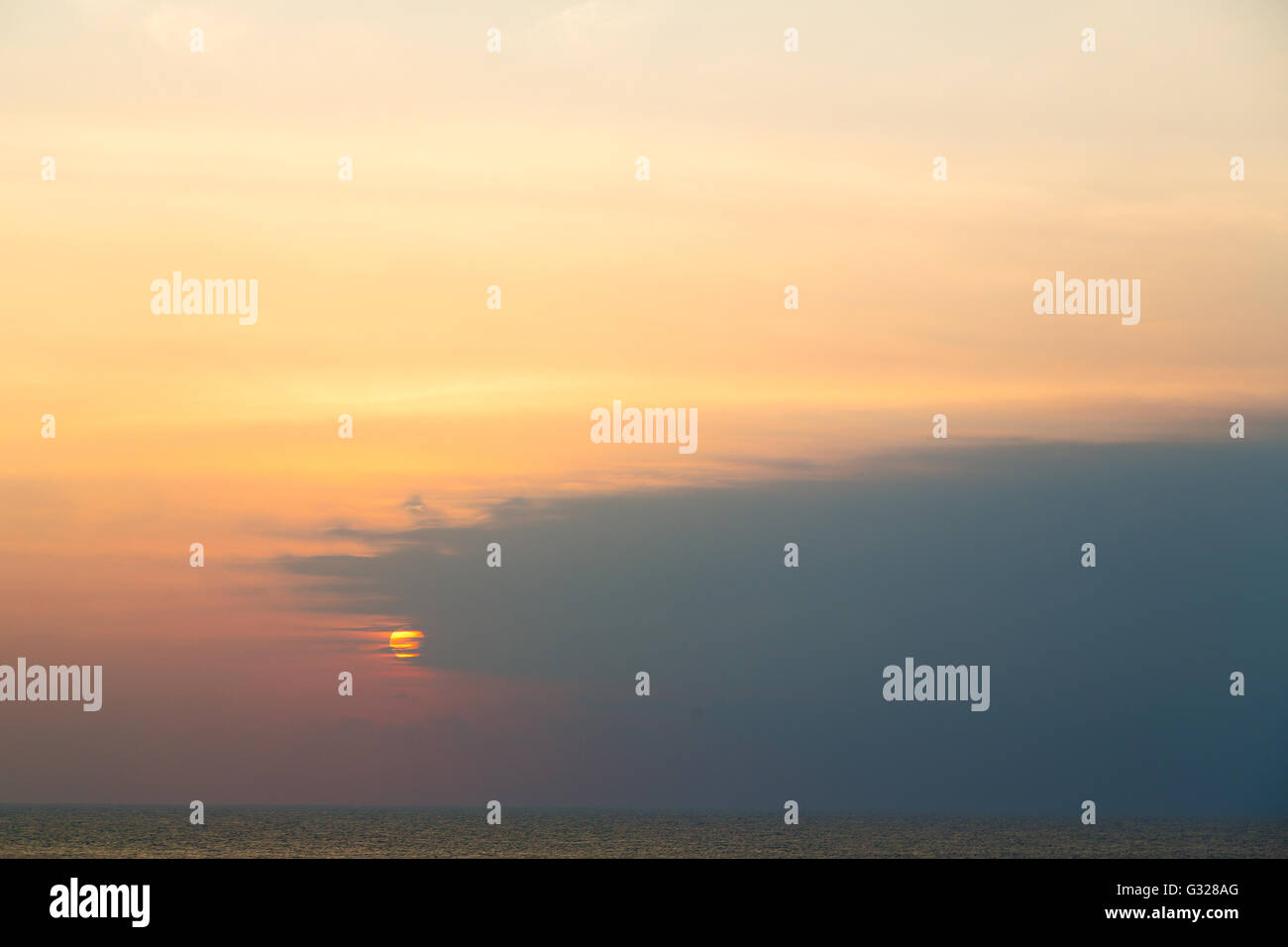 the blurred sun falling down arabian sea ocean in oman coastline Stock ...