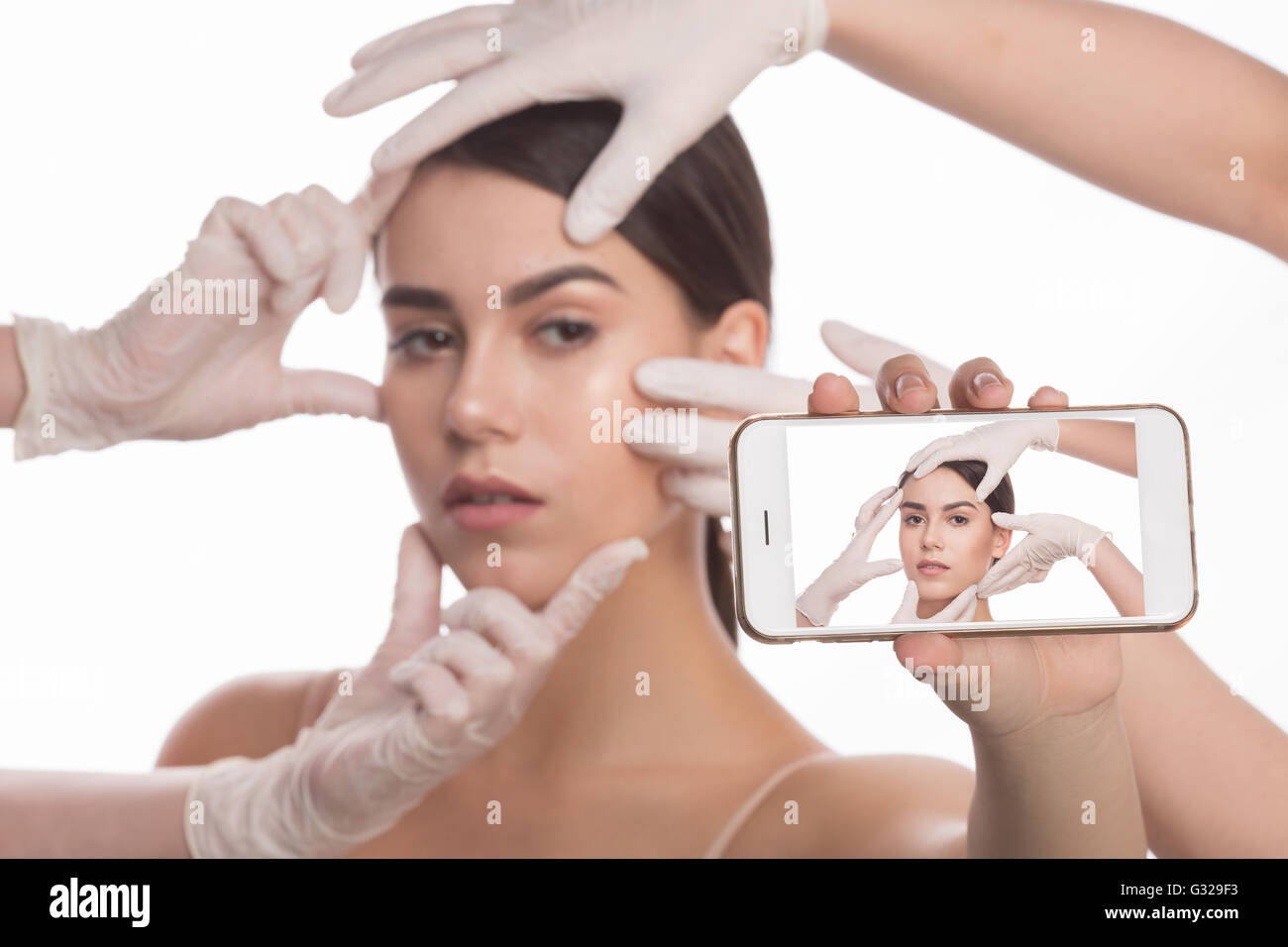 Examining face concept Stock Photo - Alamy