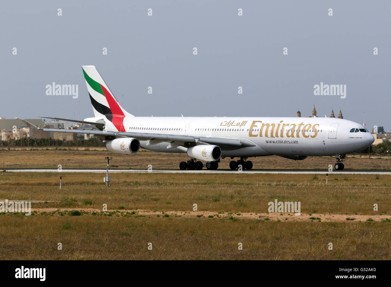 Emirates Airbus A340-313 [A6-ERM] just before taking off from runway 31 ...