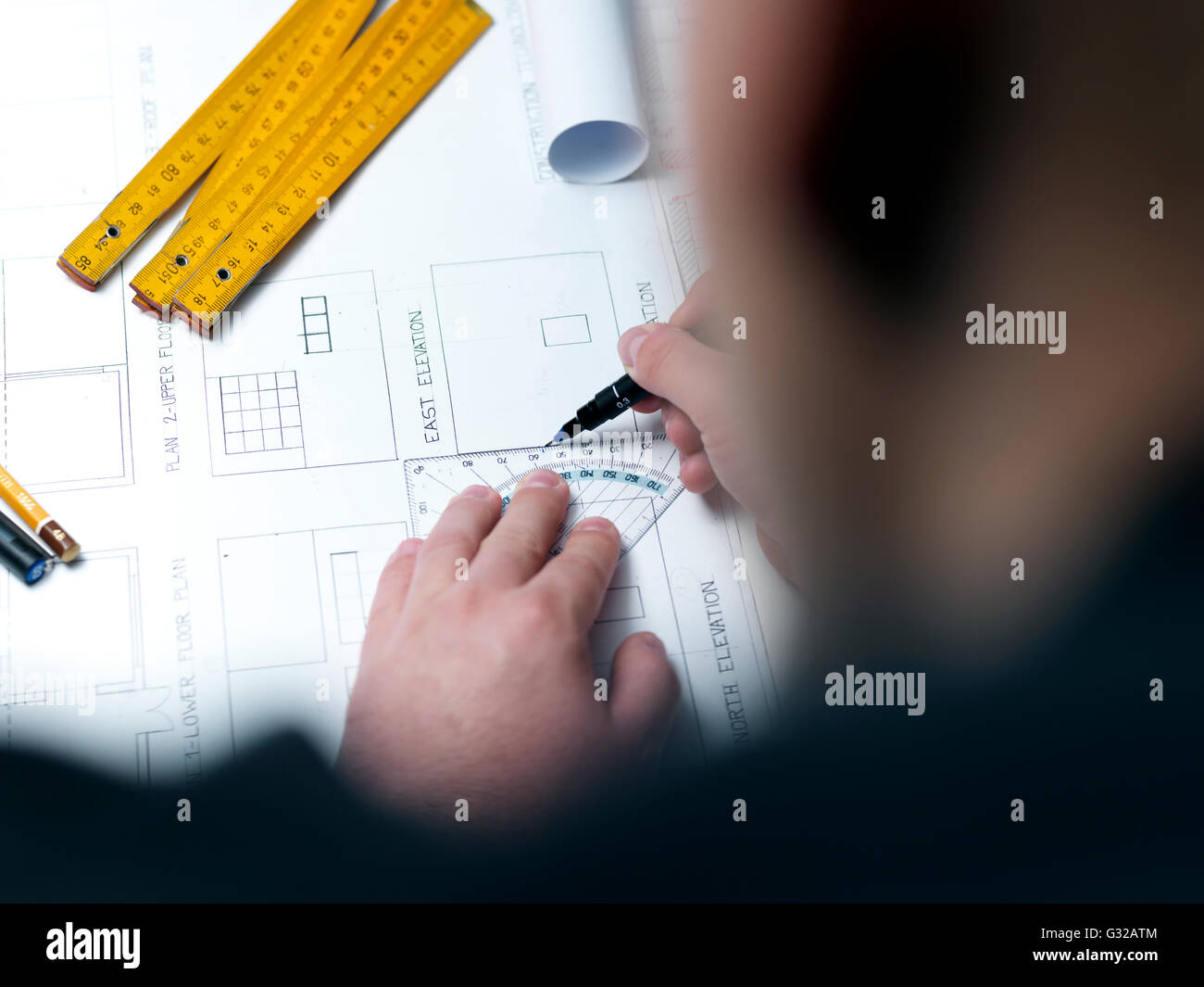 Business man draw buildings and present his architectural project Stock ...