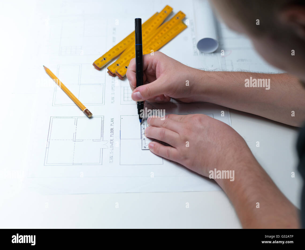 Business man draw buildings and present his architectural project Stock ...