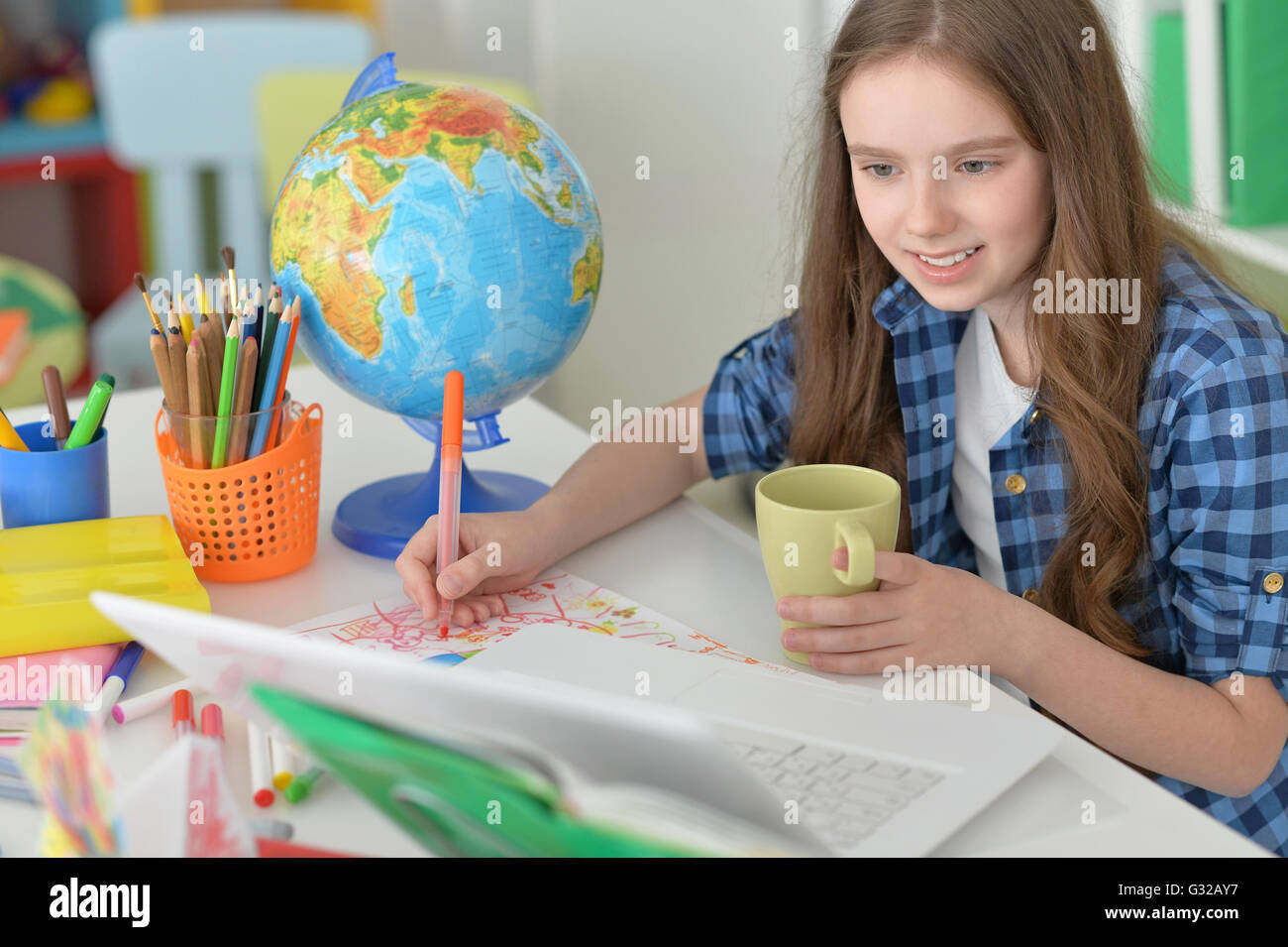 Cute student girl at class Stock Photo - Alamy