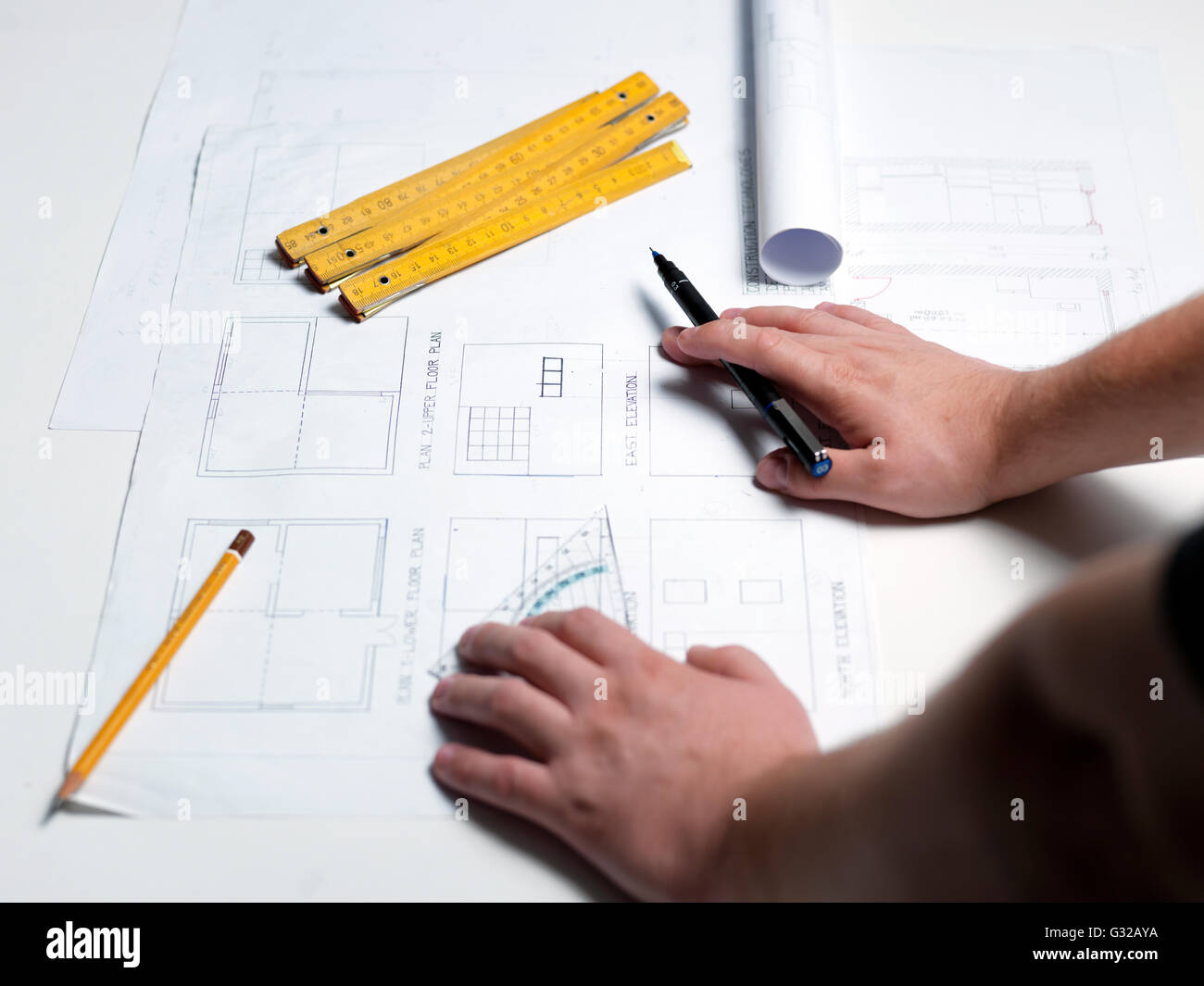 Business man draw buildings and present his architectural project Stock ...