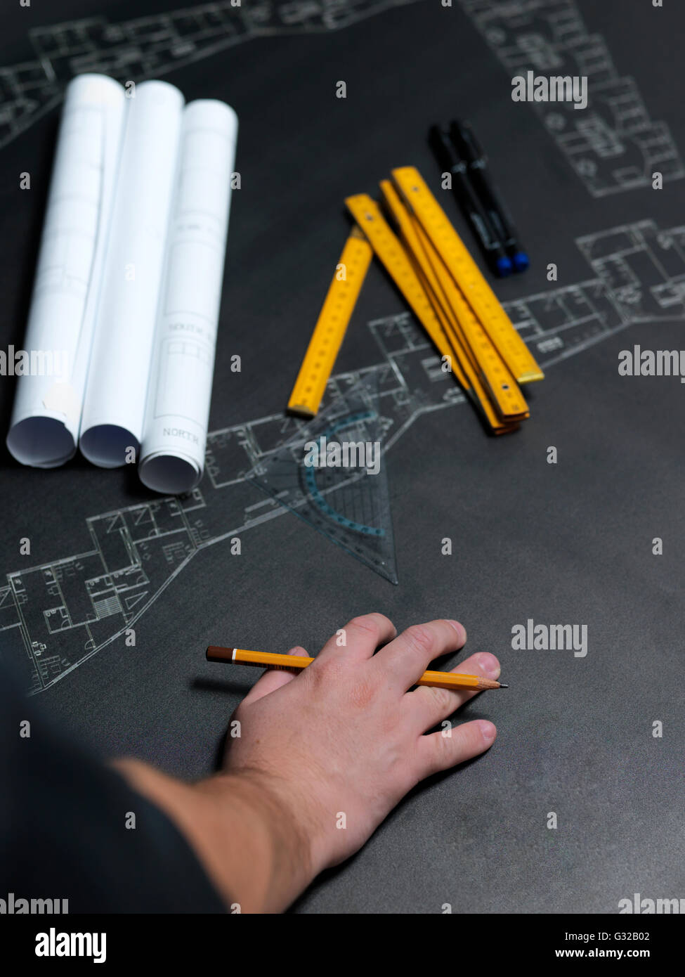 Business man draw buildings and present his architectural project Stock ...