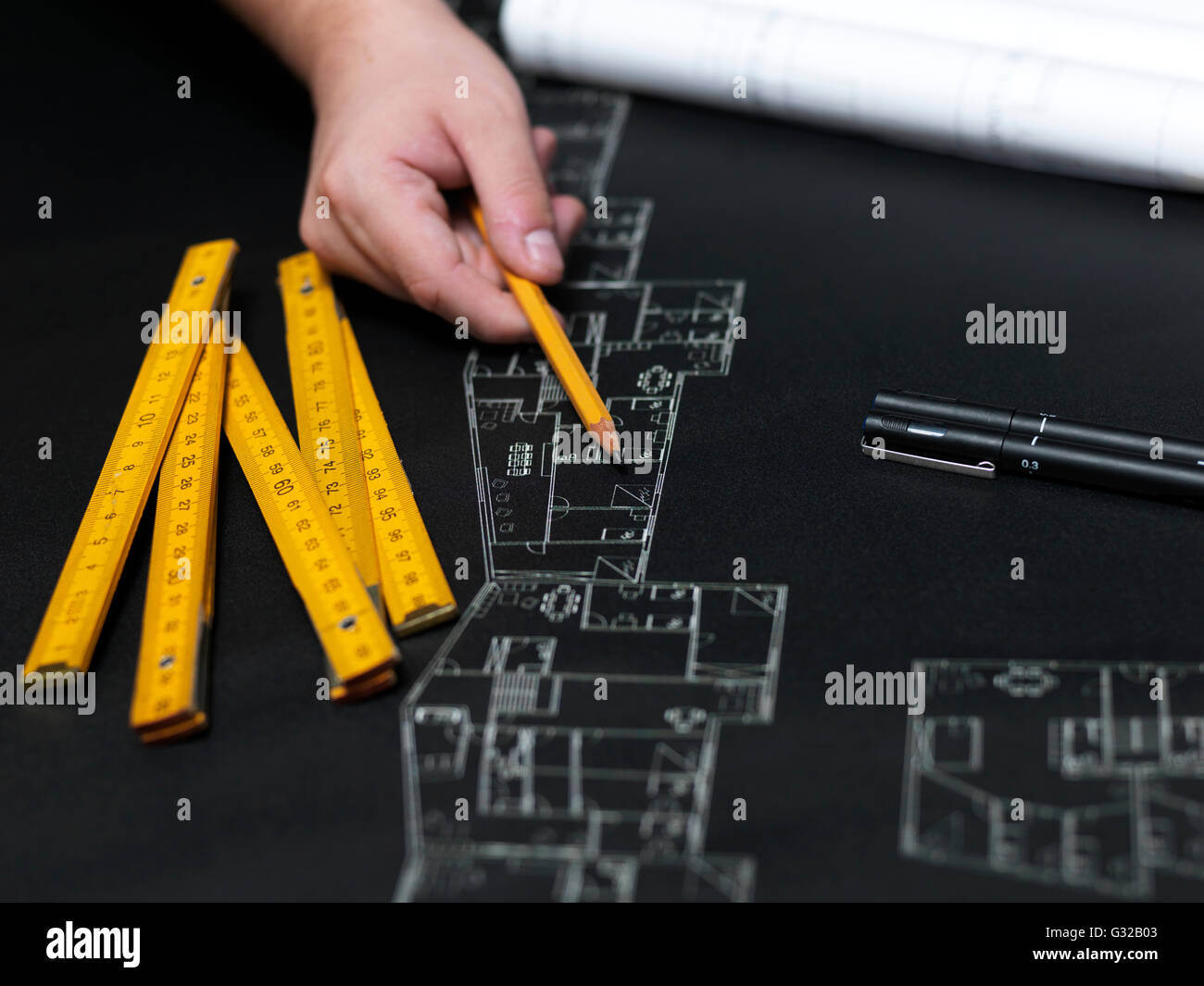 Business man draw buildings and present his architectural project Stock ...
