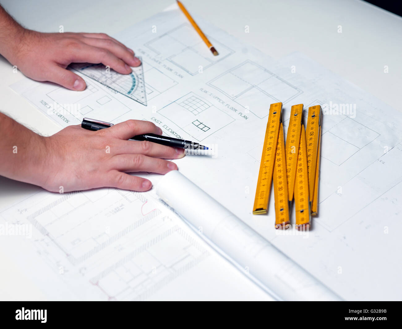 Business man draw buildings and present his architectural project Stock ...