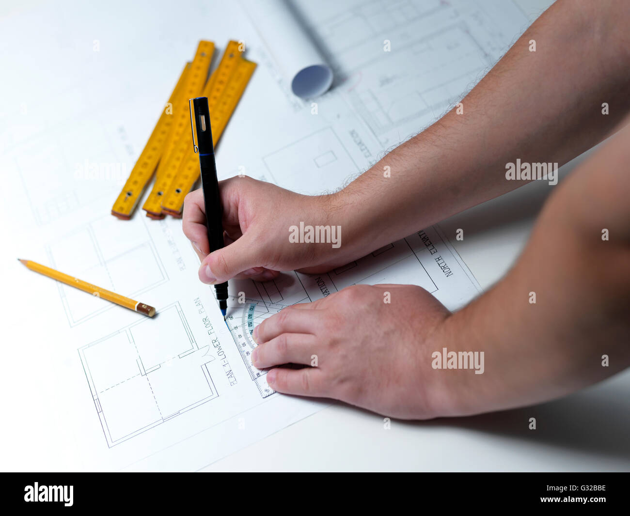Business man draw buildings and present his architectural project Stock ...