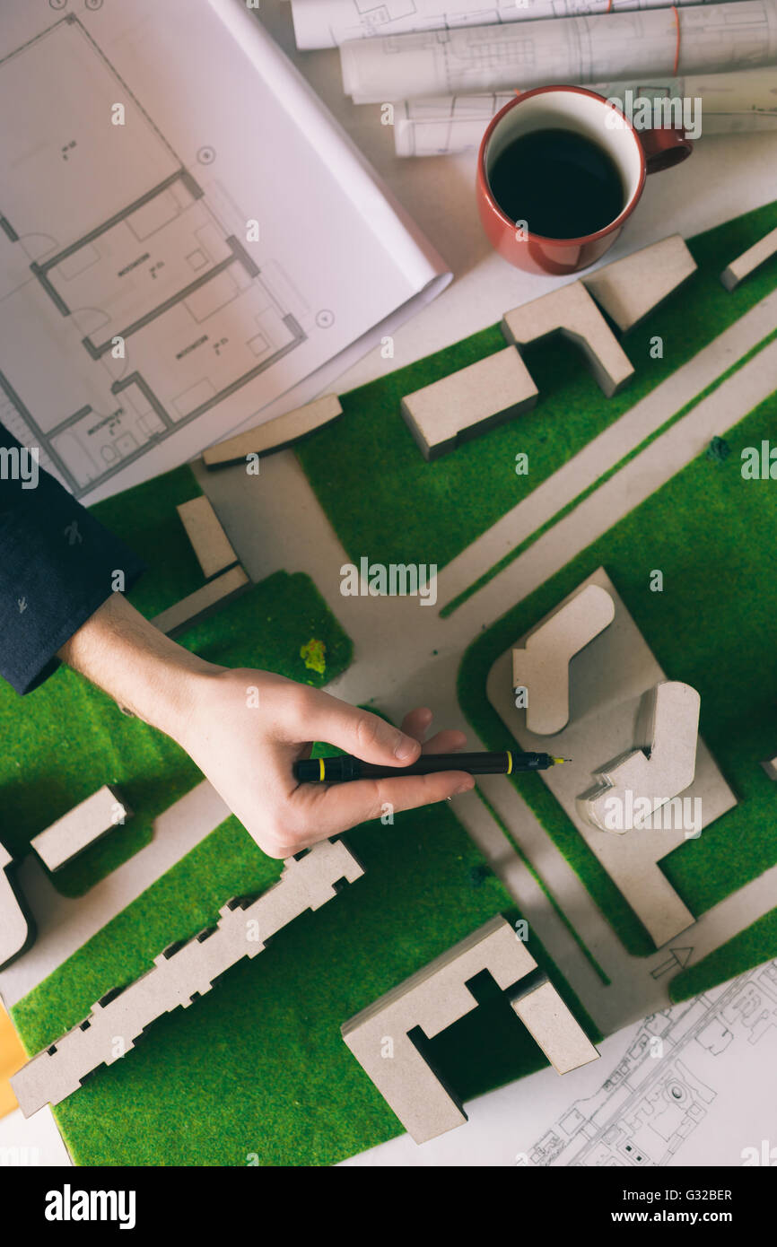 Top view of architect drawing on architectural project Stock Photo - Alamy