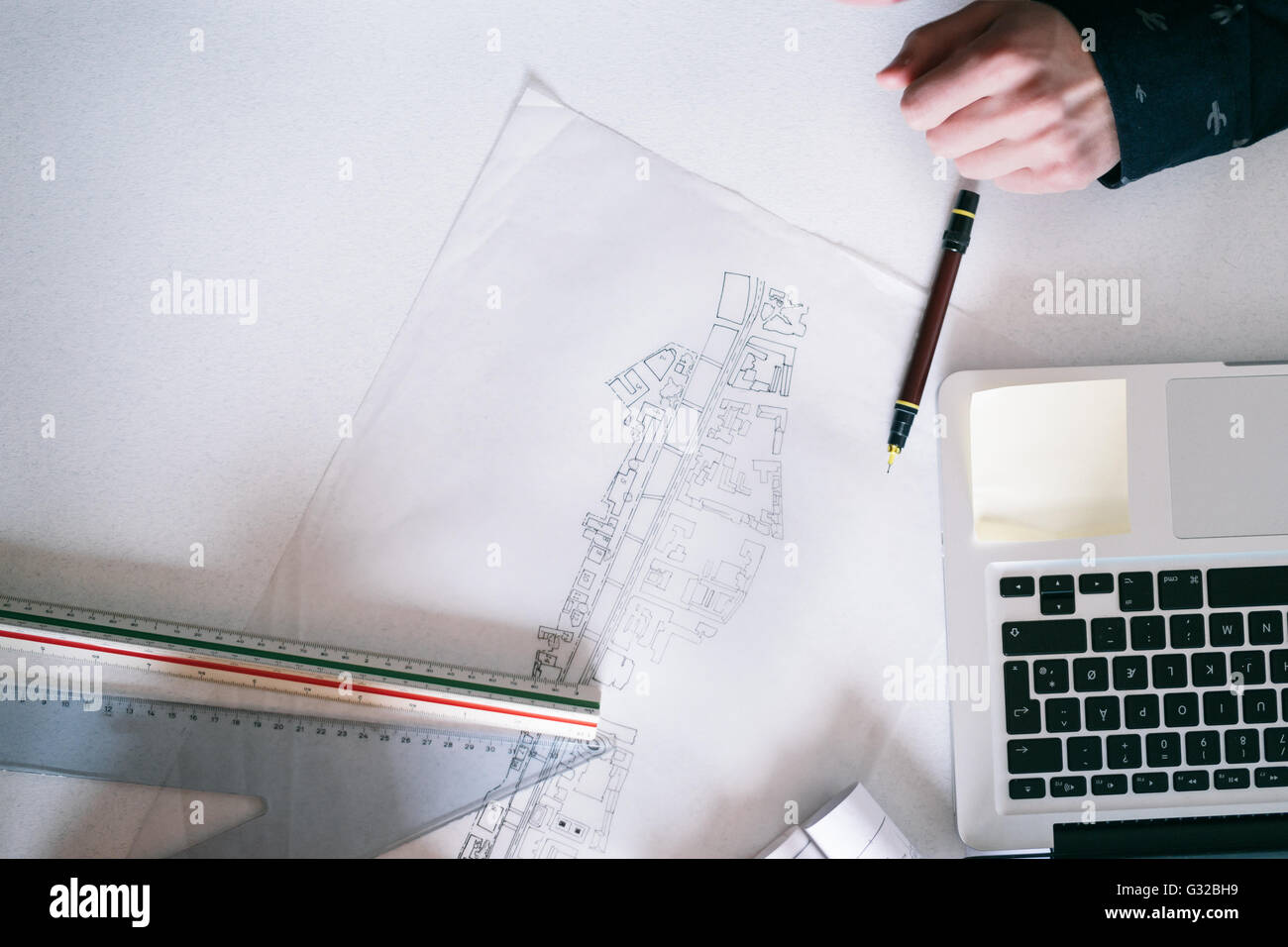 Top view of architect drawing on architectural project Stock Photo - Alamy