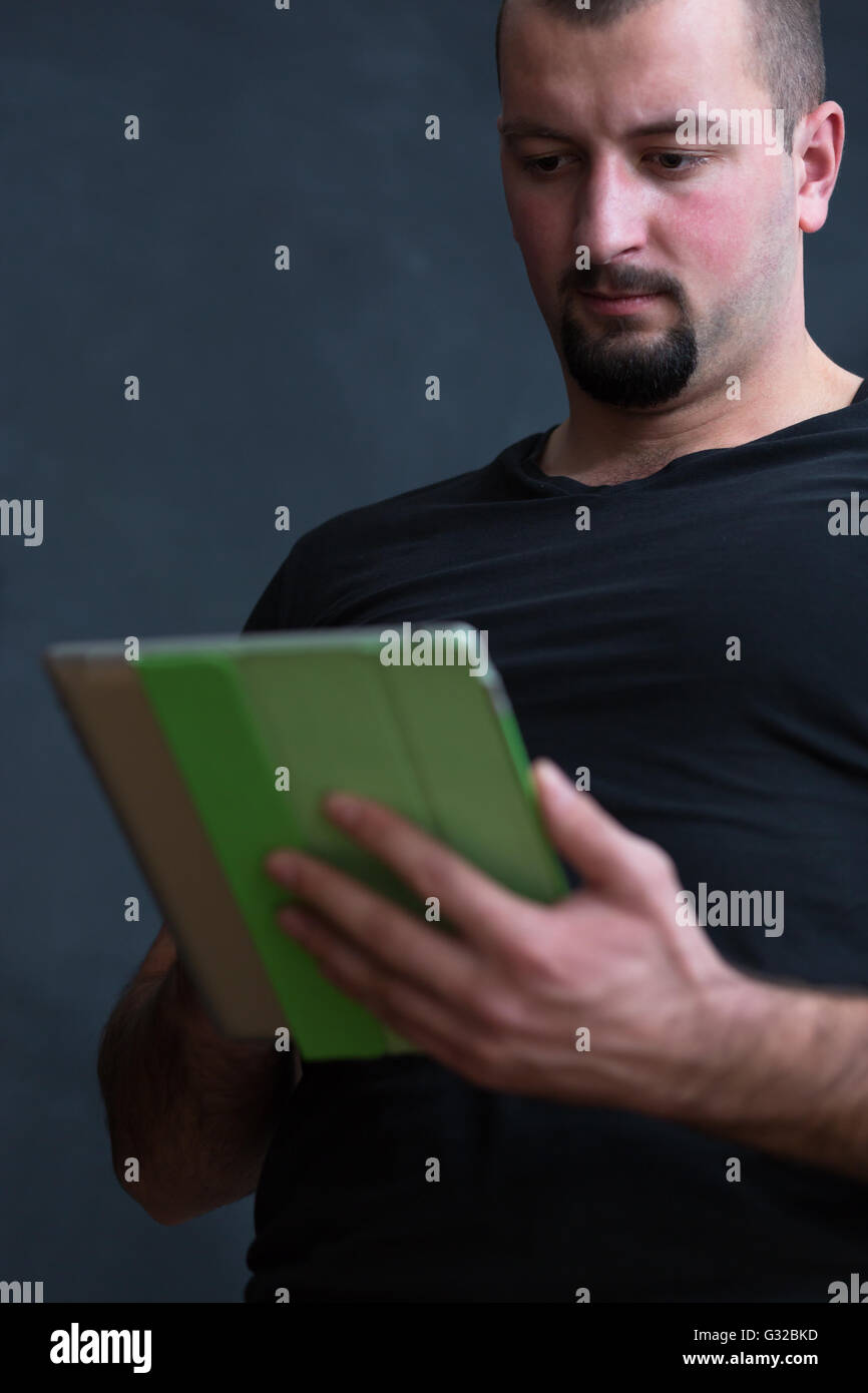 Man phone pc tablet multitasking hi-res stock photography and images ...