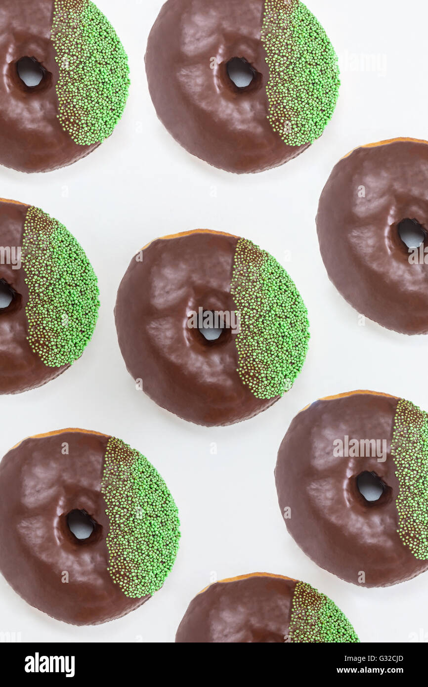 lots of donuts in rows, pattern made of donuts Stock Photo - Alamy