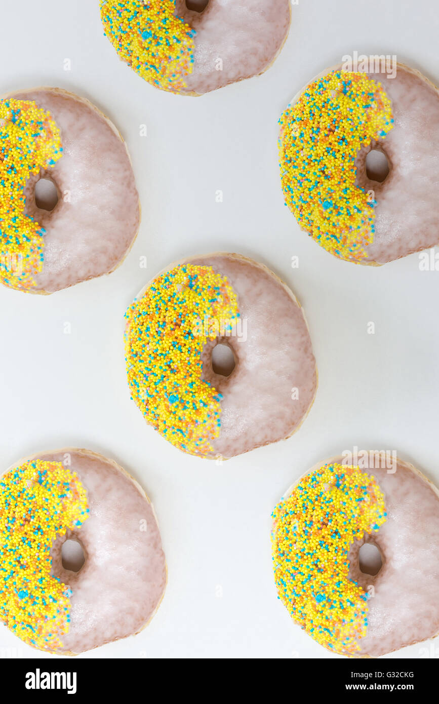 lots of donuts in rows, pattern made of donuts Stock Photo - Alamy
