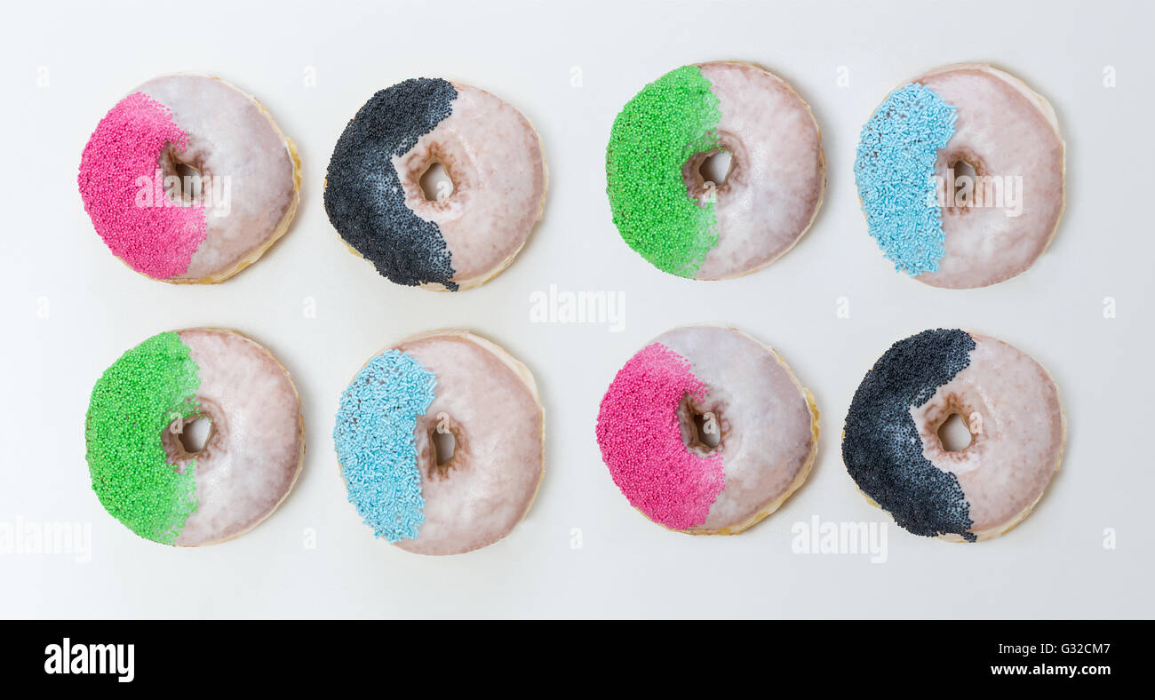 lots of donuts in rows, pattern made of donuts Stock Photo - Alamy