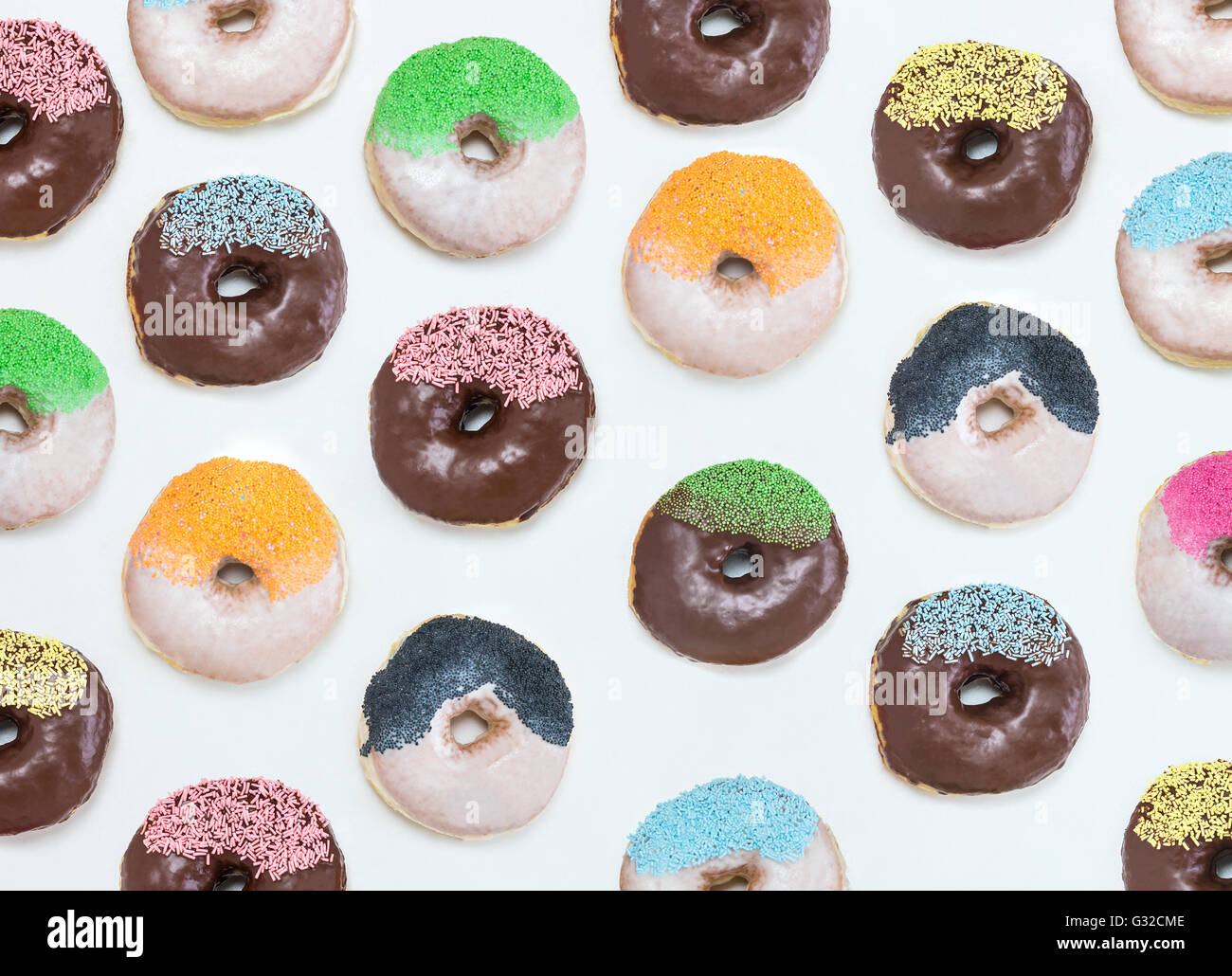 lots of donuts in rows, pattern made of donuts Stock Photo - Alamy