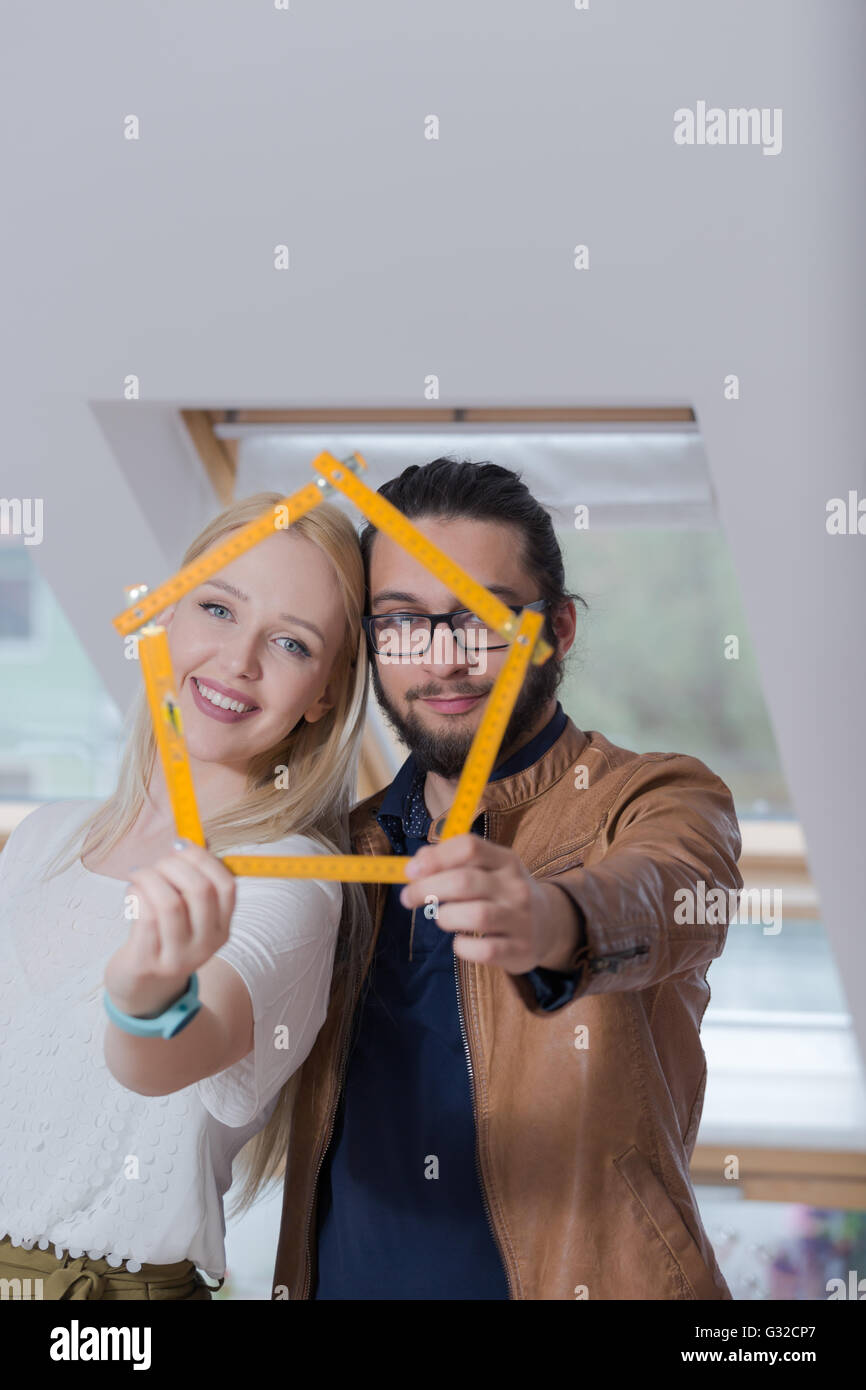 Portrait of happy young property owners Stock Photo - Alamy