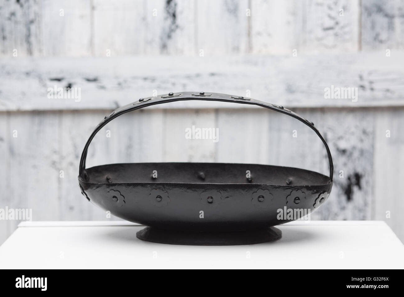 Ancient bowl on table Stock Photo - Alamy