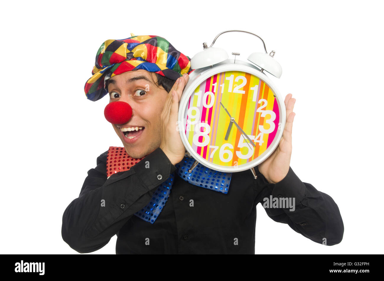 Funny clown with clock isolated on white Stock Photo - Alamy