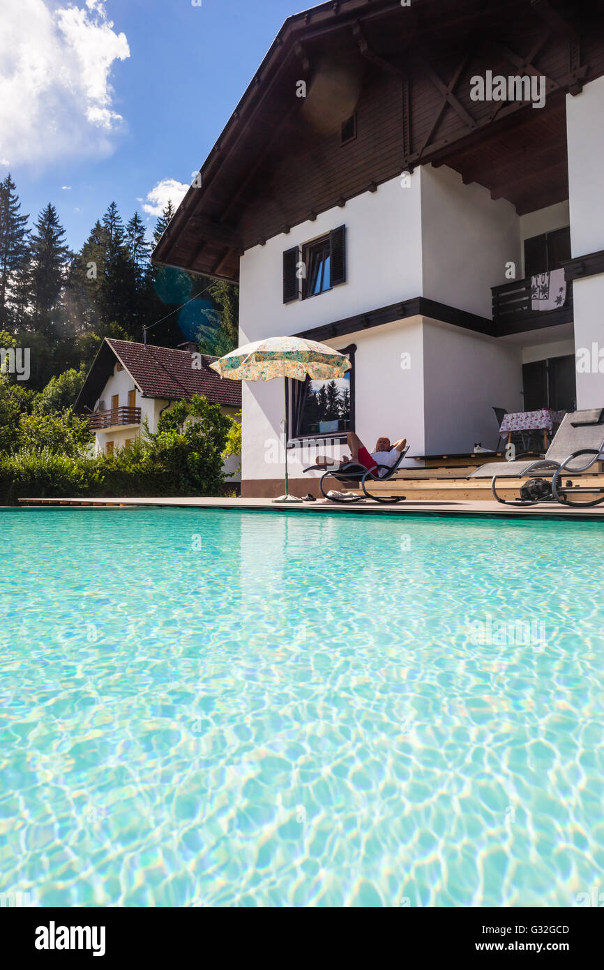 Man chilling at the beach hi-res stock photography and images - Alamy