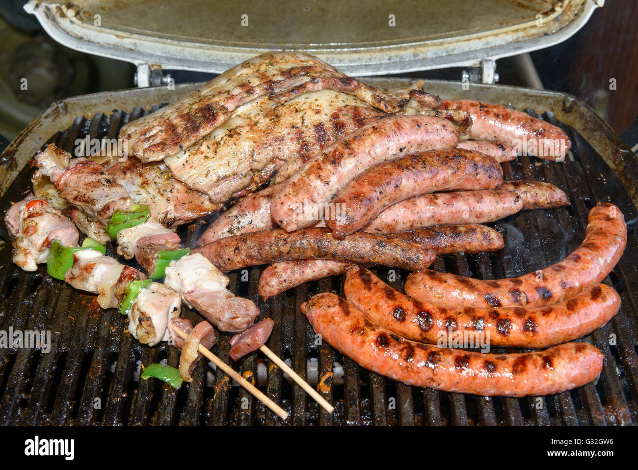 different grilled meat on the barbecue Stock Photo - Alamy