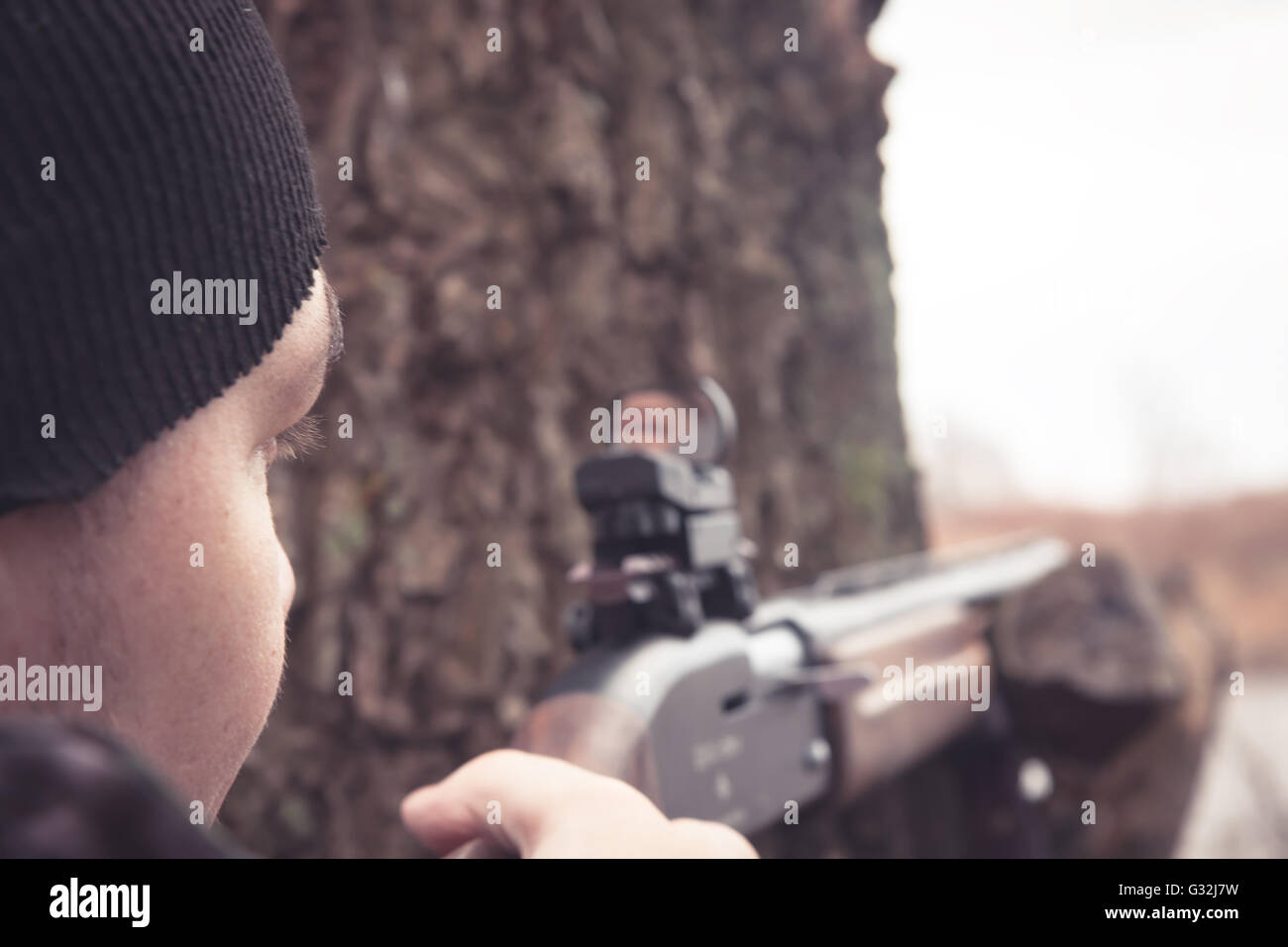 Man with gun aiming and prepared to make a shot during hunting Stock ...