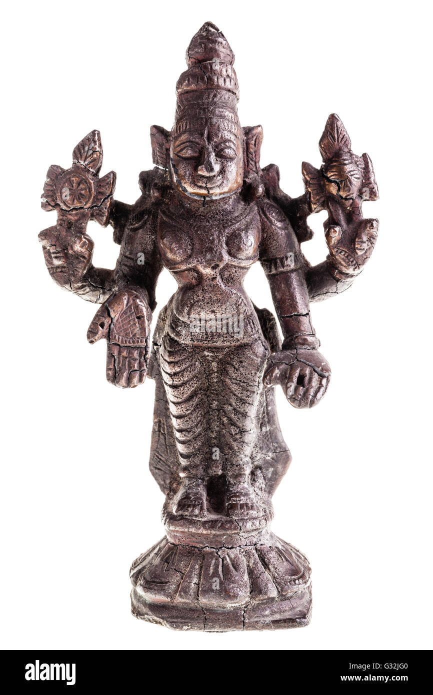 an ancient indian divinity statuette isolated over a white background ...