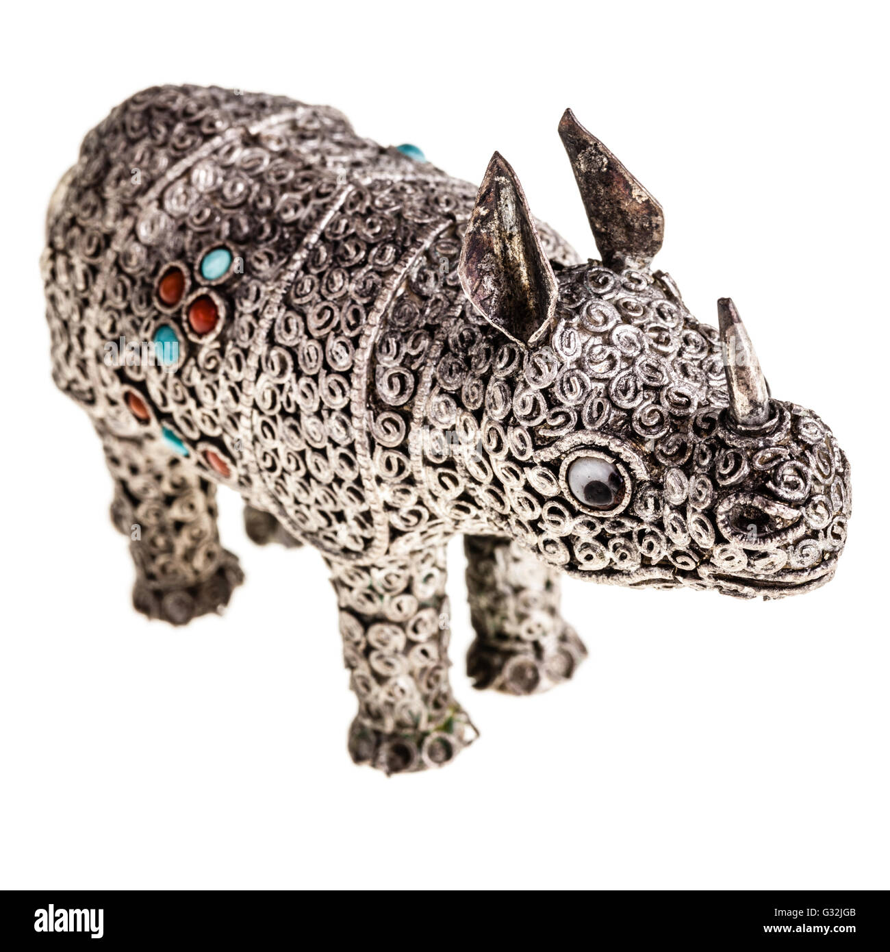 a silver rhino figurine isolated over a white background Stock Photo ...