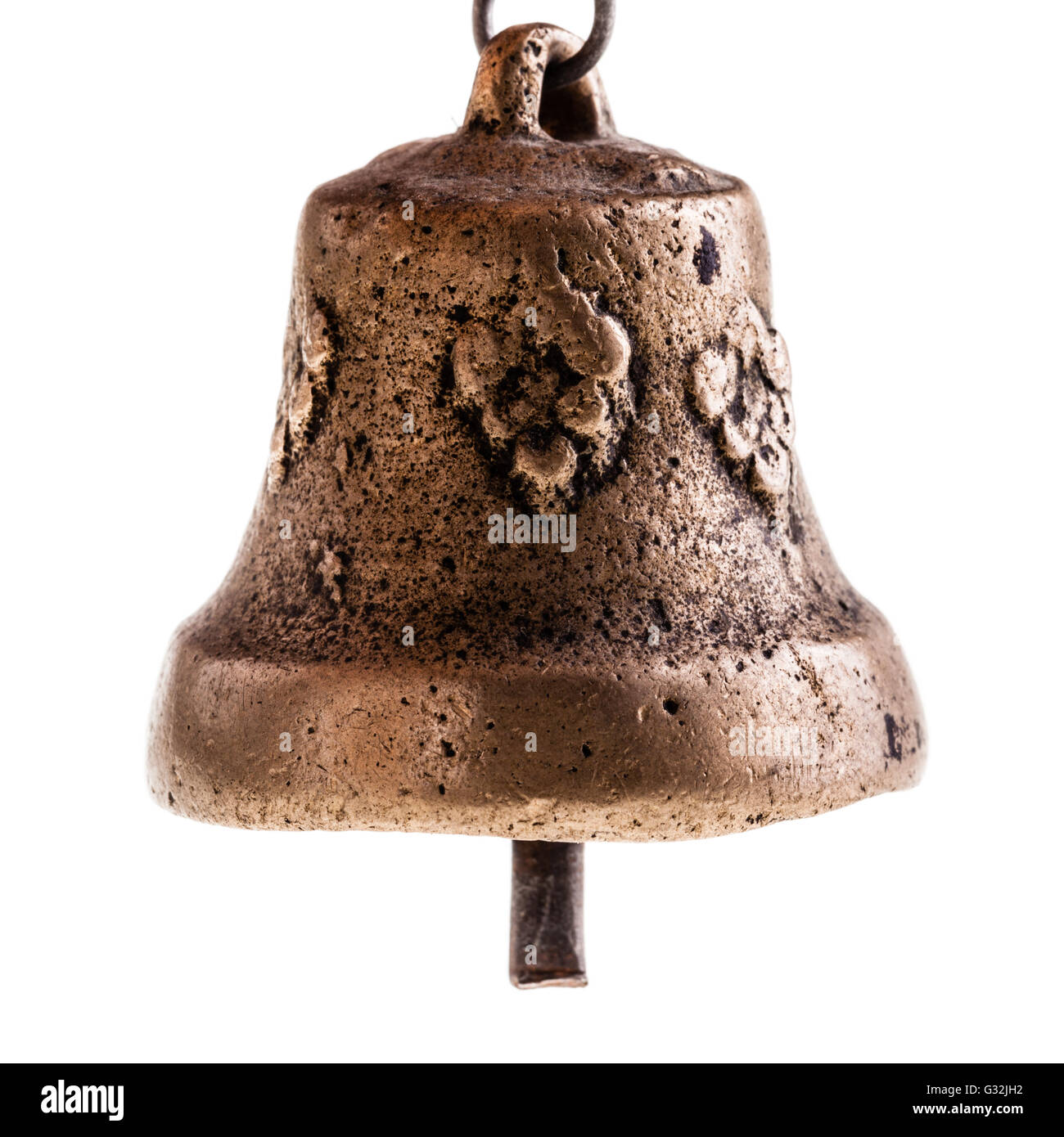 a small ancient indian bronze bell isolated over a white background ...