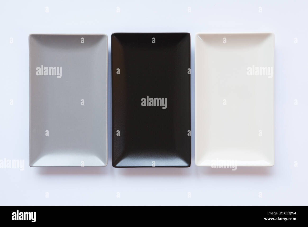 Different ceramic dishes on over white background, rectangle dish Stock ...